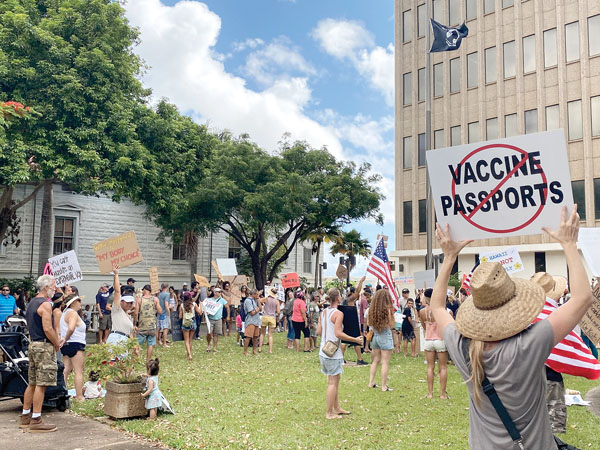 Hundreds protest mask and vaccine mandates | News, Sports, Jobs - Maui News